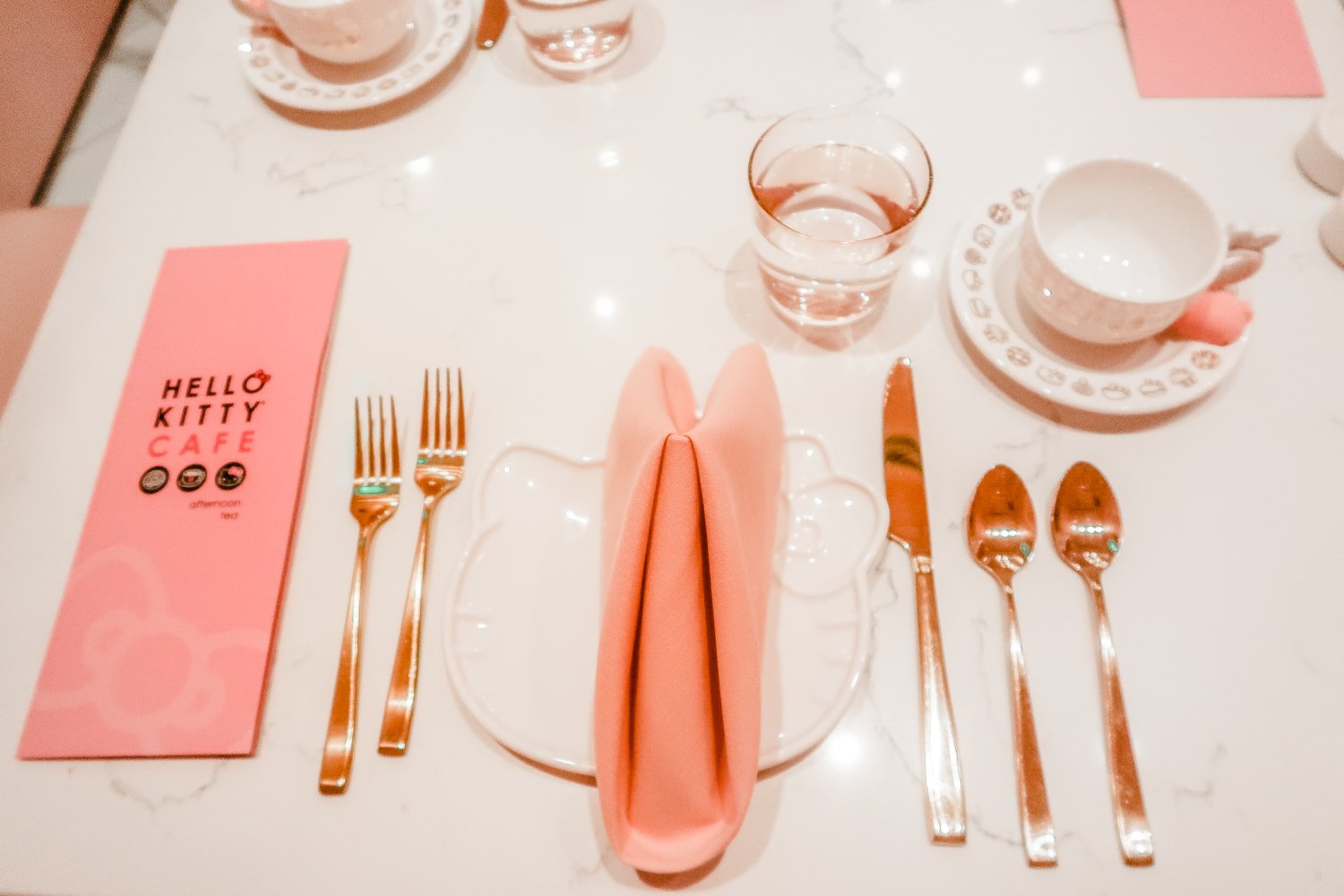 Tea Time at the Exclusive Hello Kitty Cafe Bow Room - Kelsey Bang