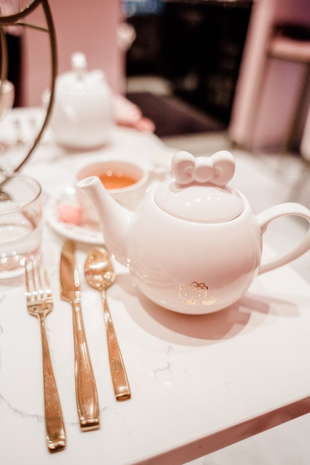 Tea Time at the Exclusive Hello Kitty Cafe Bow Room - Kelsey Bang
